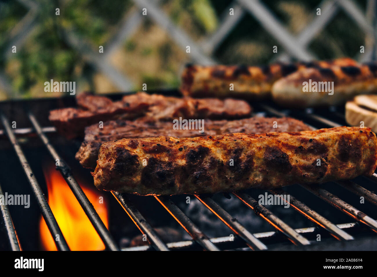 barbecue on summer evening Stock Photo - Alamy