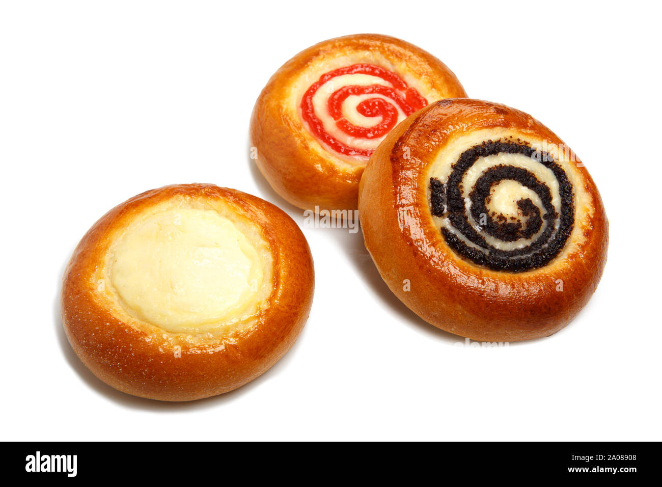 Group of rosy delicious buns with curd isolated on white background ...