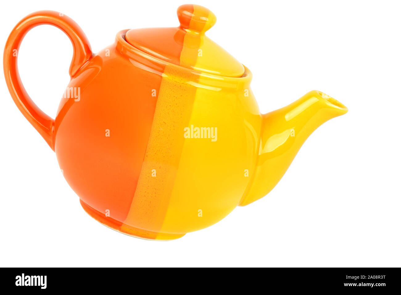 Orange color porcelain teapot, isolated on white background. Free space ...