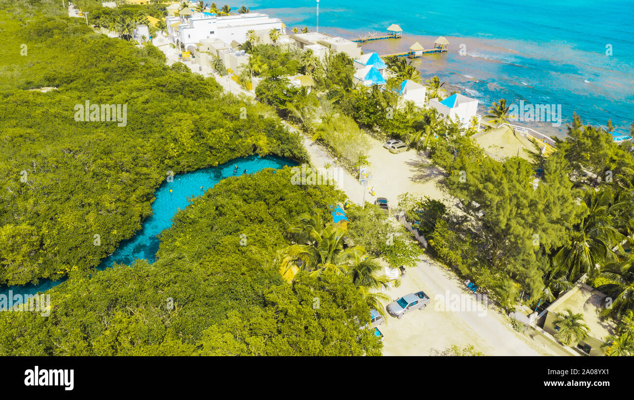 Ocean meets salt Water. Aerial view of Casa Cenote in Tulum, Quintana ...