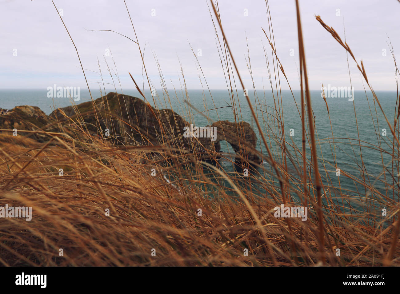 Dorset`s Durdle door, beautiful rock formation on the English shore ...