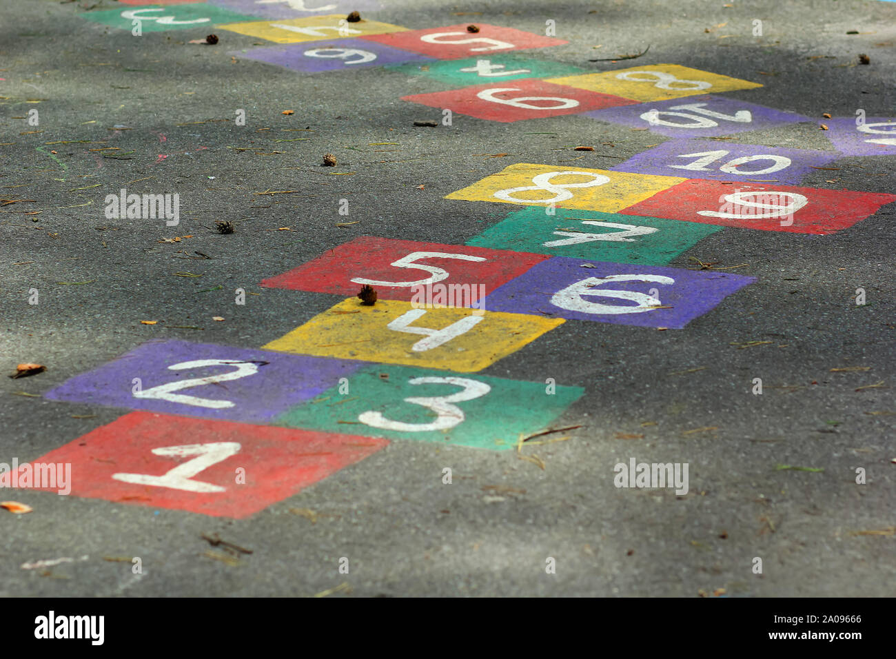Hopscotch game drawn with paint in the park. Playground marking Stock ...