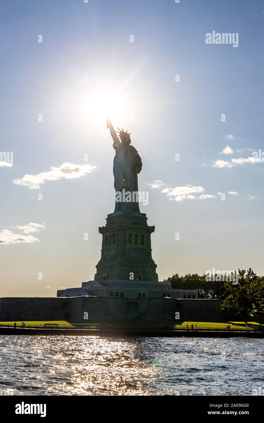 Statue of Liberty with the sun in her hand in New York City Stock Photo ...