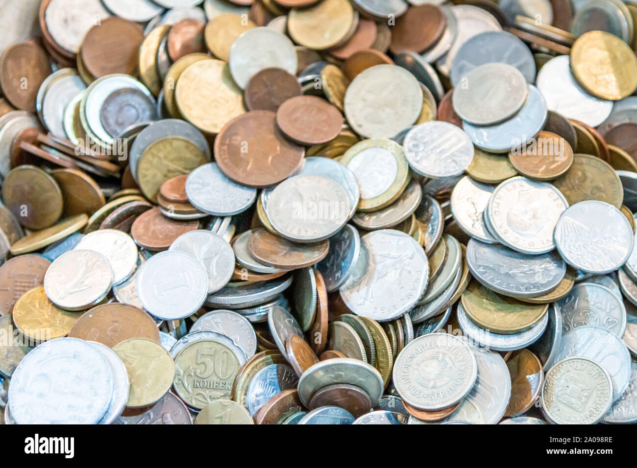 Old antique coins on display in antique shop Stock Photo - Alamy