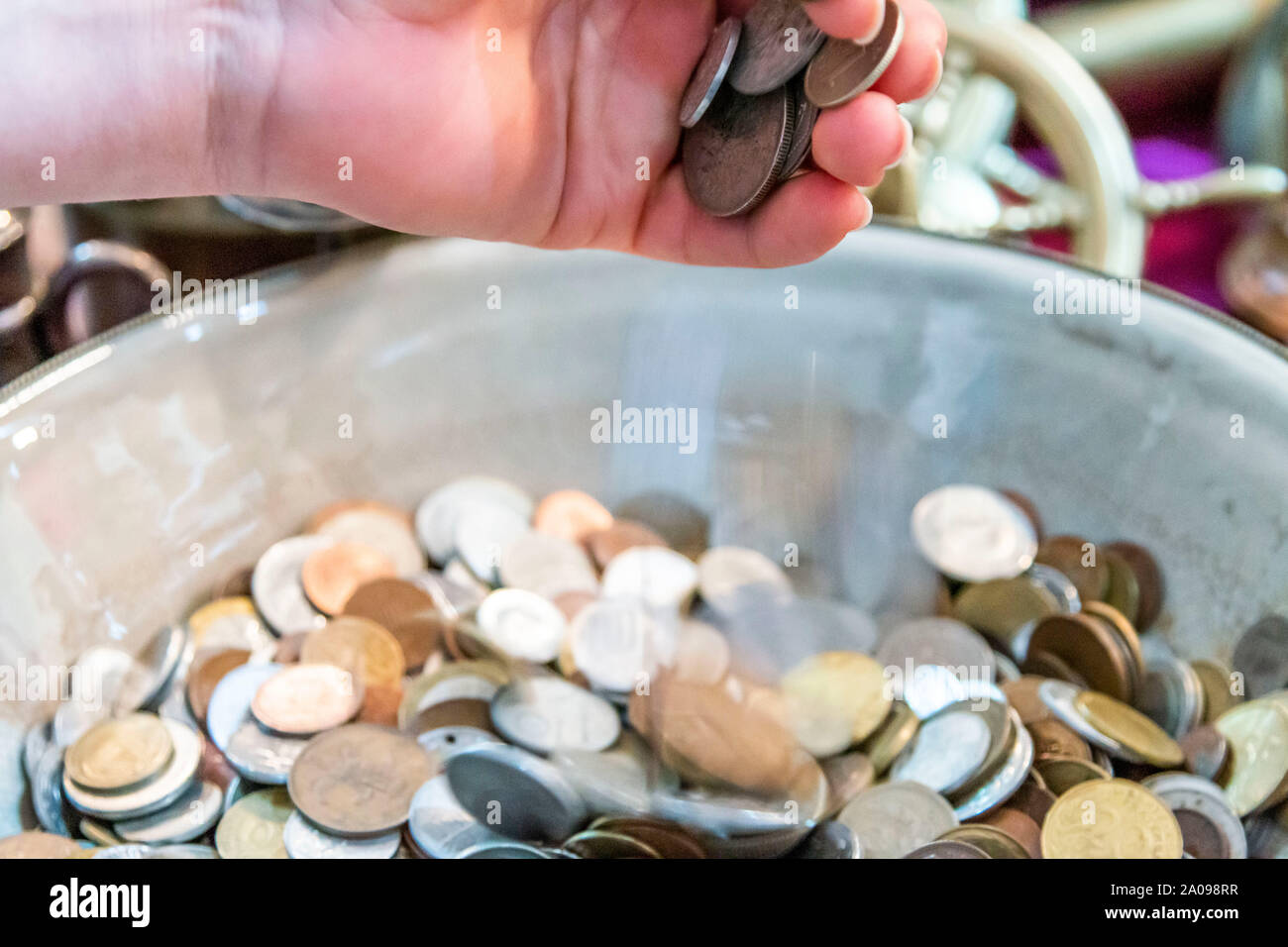 Old antique coins on display in antique shop Stock Photo - Alamy