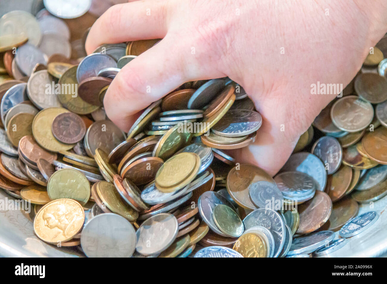 Old antique coins on display in antique shop Stock Photo - Alamy