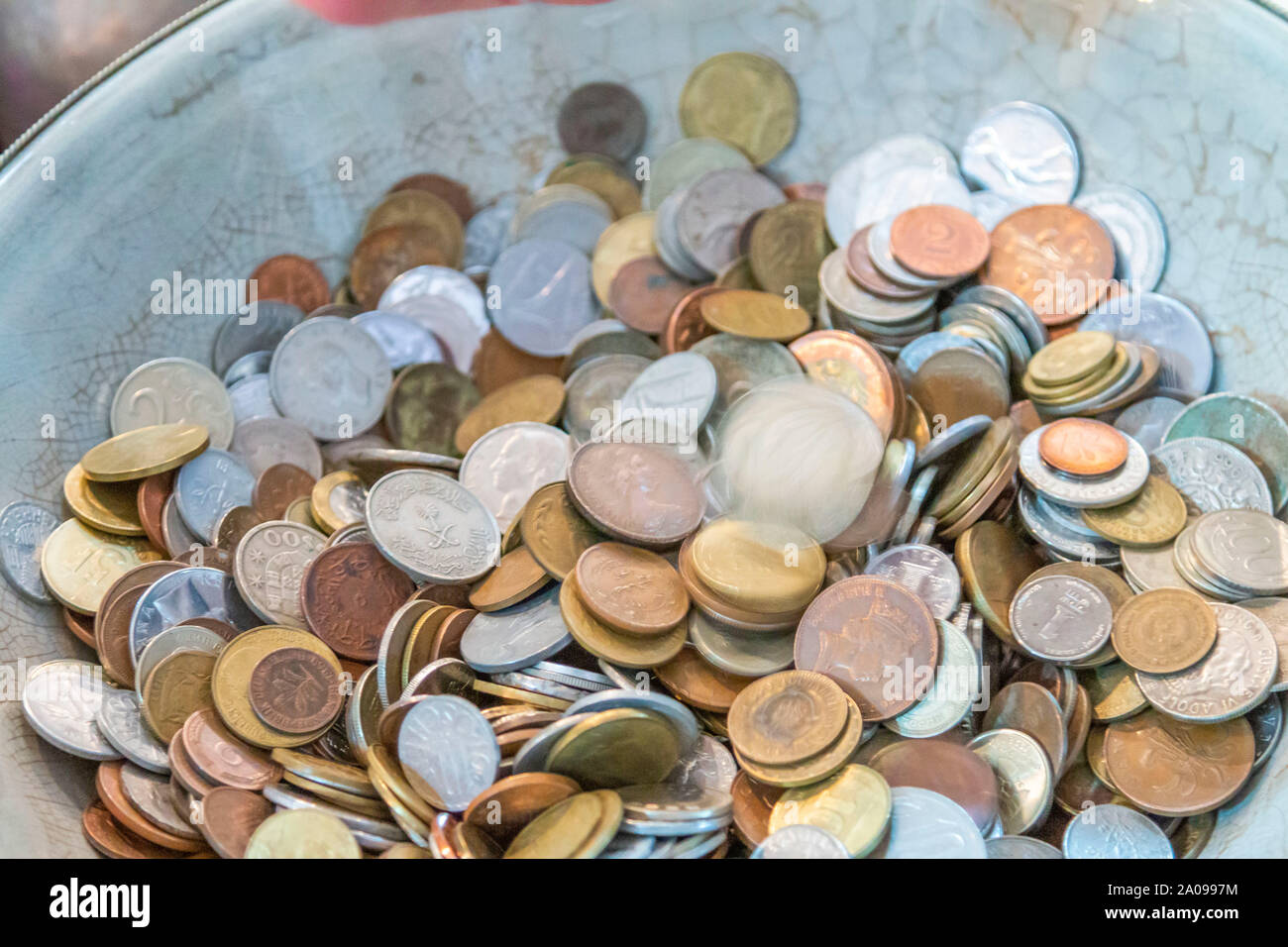 Old antique coins on display in antique shop Stock Photo - Alamy