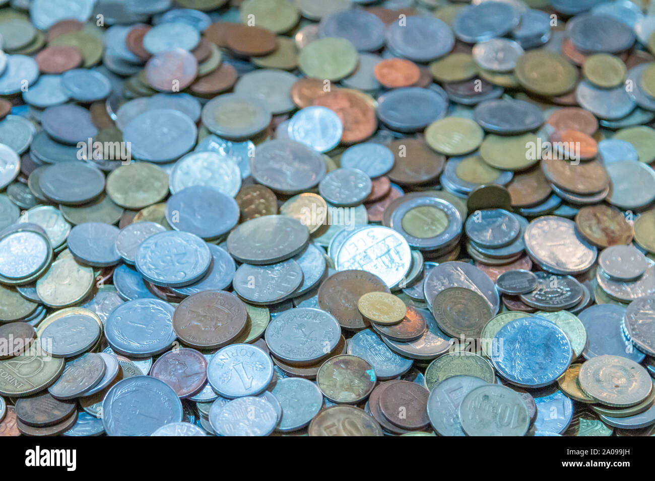 Old antique coins on display in antique shop Stock Photo - Alamy