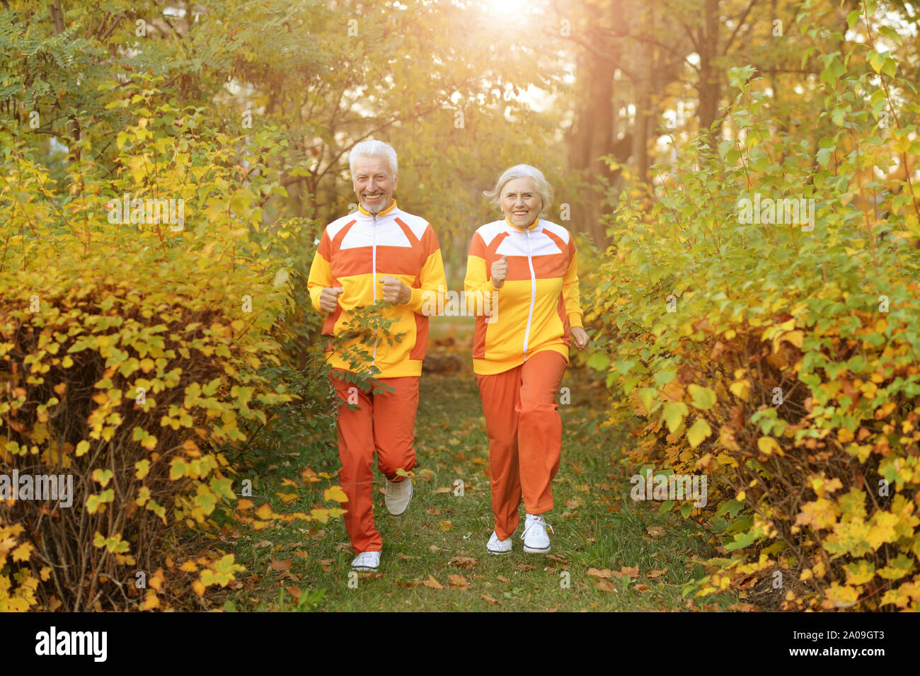 Old lady jogging hi-res stock photography and images - Alamy