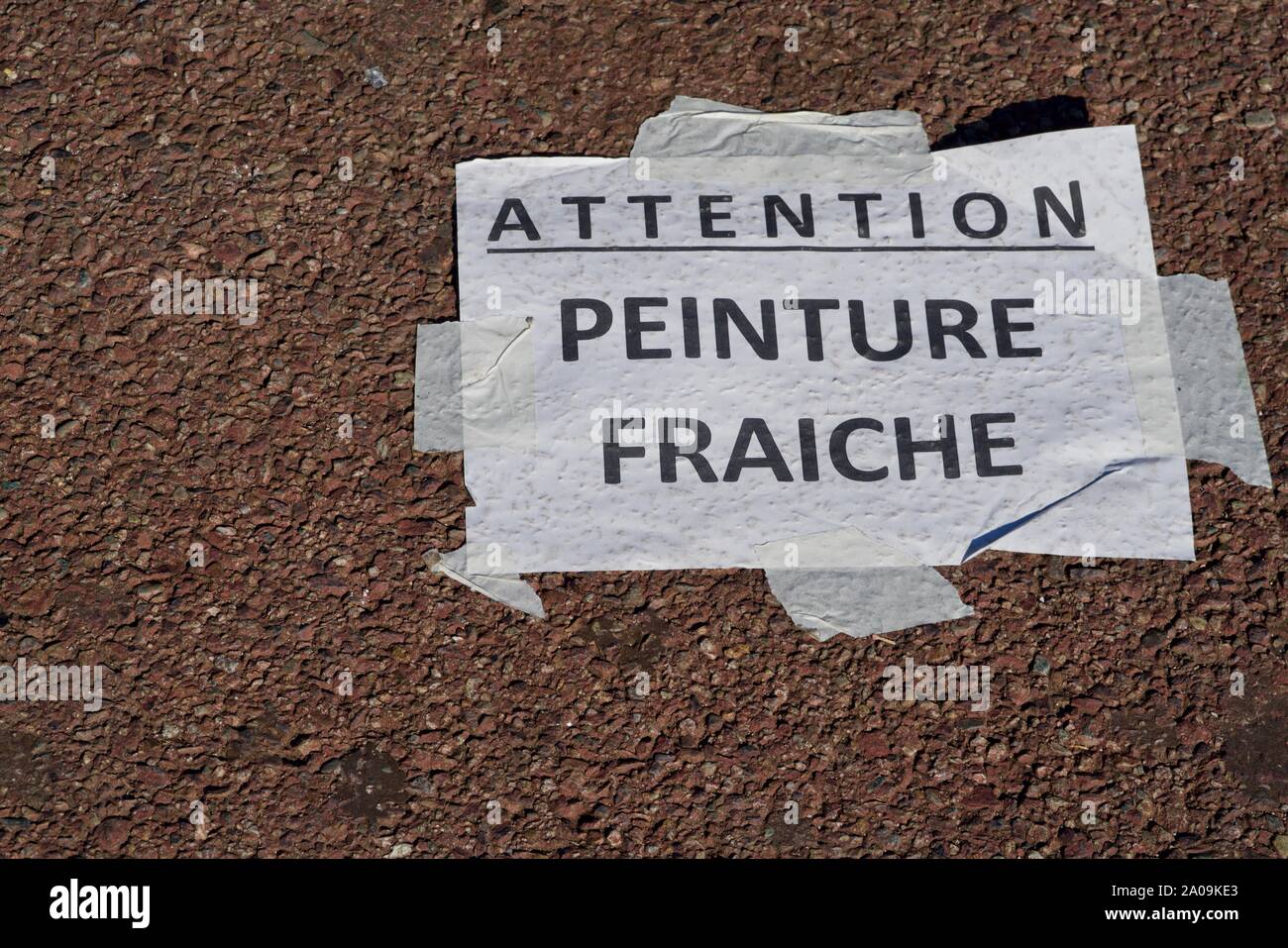 Warning of fresh coat of paint Stock Photo - Alamy