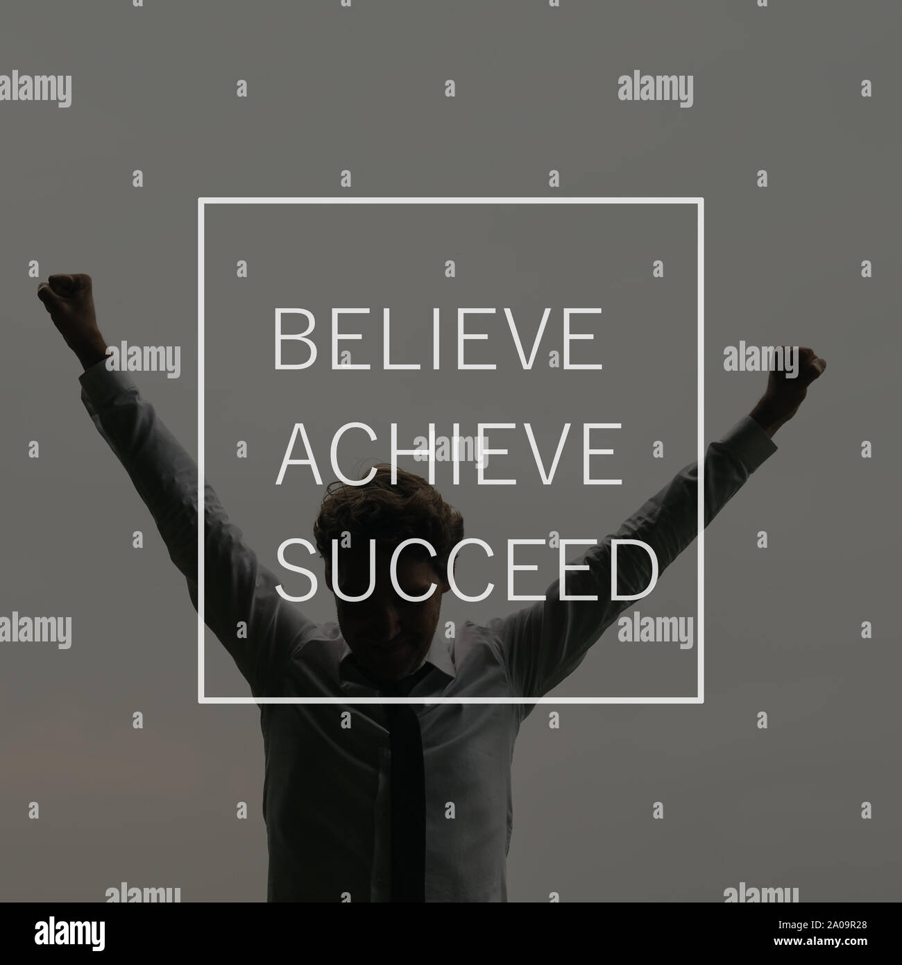 Believe, achieve, succeed sign over a photo of successful young ...