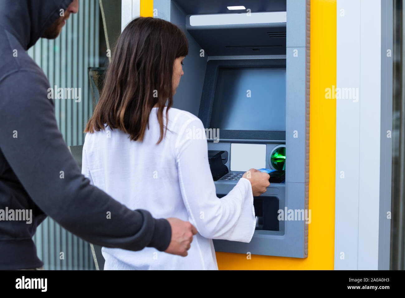 Person using a atm hi-res stock photography and images - Alamy
