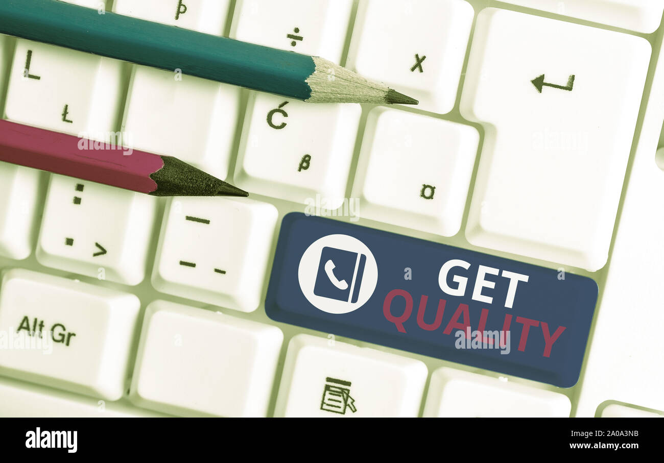 Writing note showing Get Quality. Business concept for features and ...