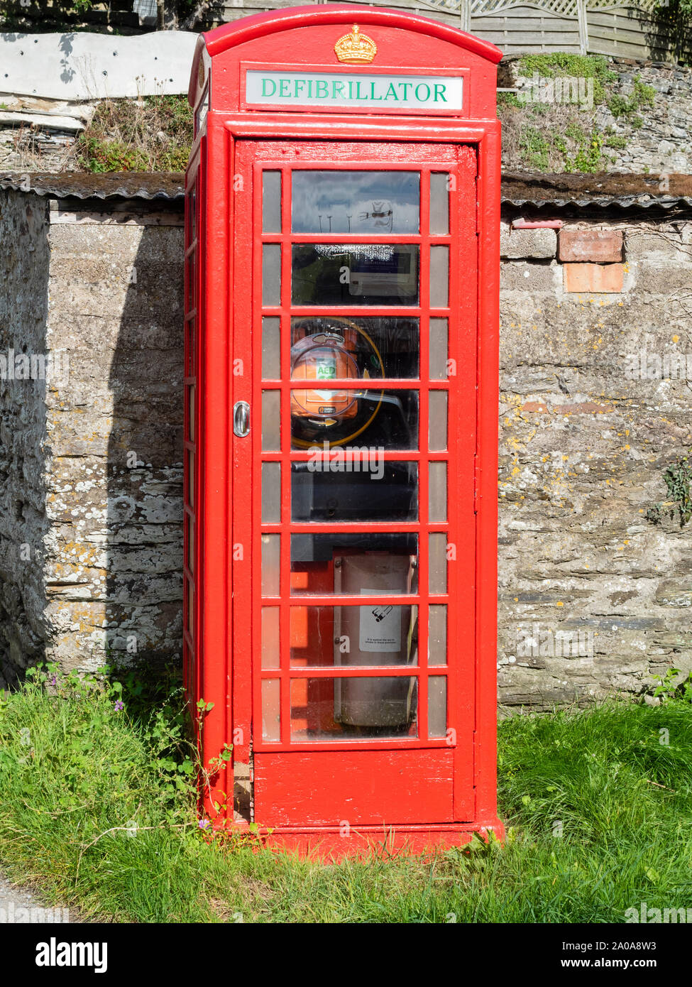 Iconic obsolete BT red phone box repurposed to house a defibrillator in ...