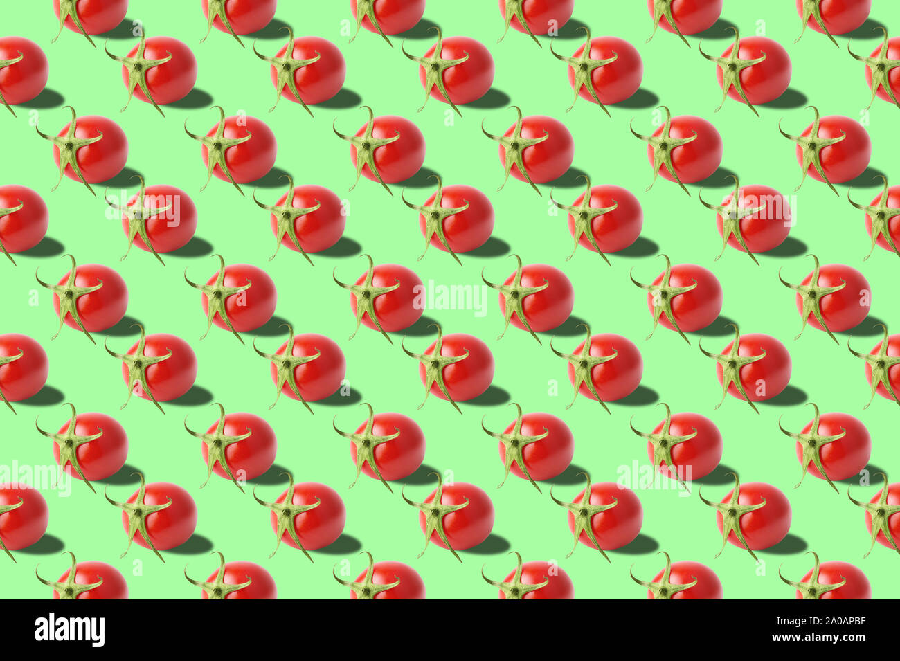tomatoes texture on green background. From top view. full depth of ...