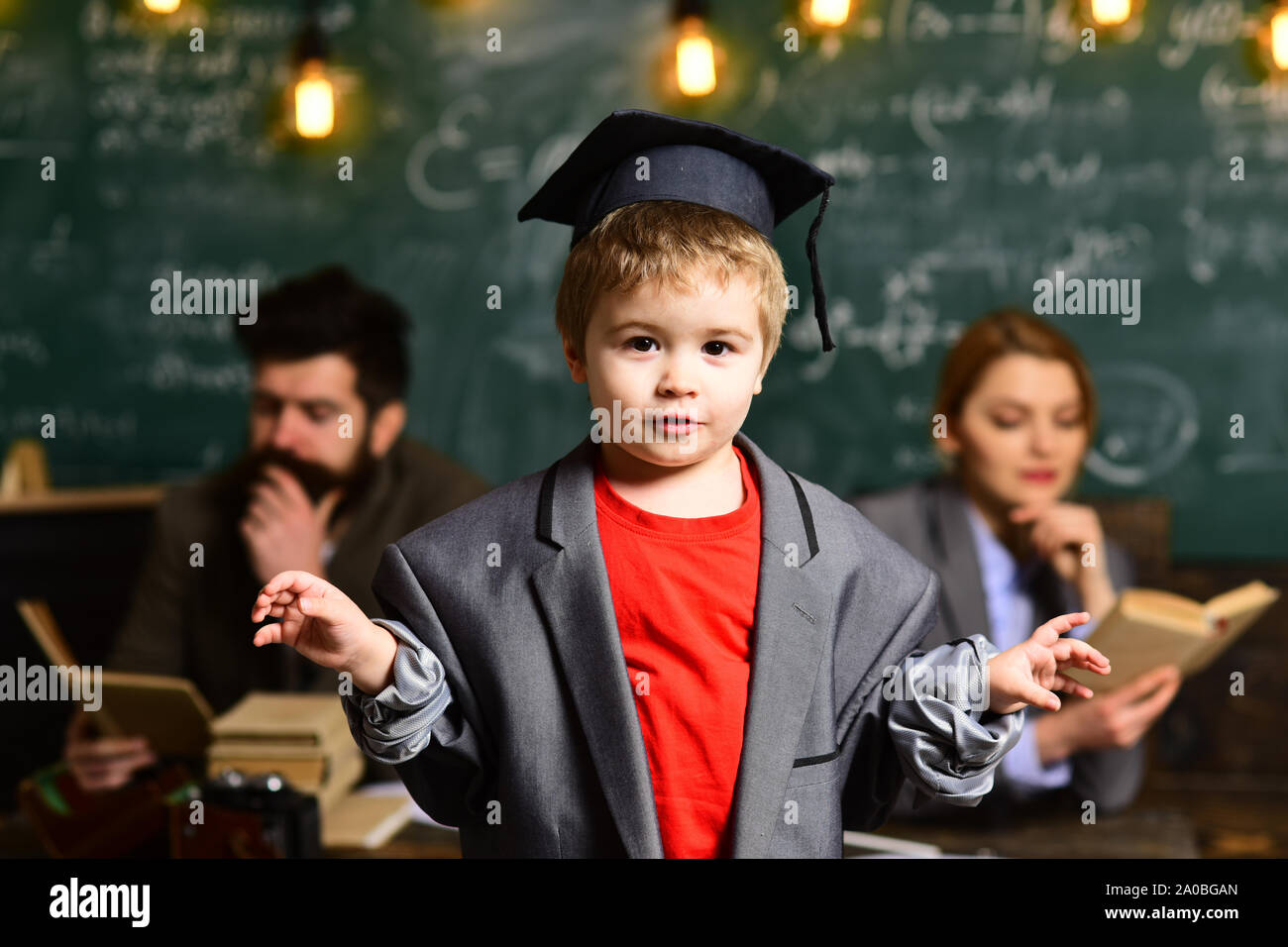 Business tutor typing on laptop at workplace in classroom. Good teacher ...