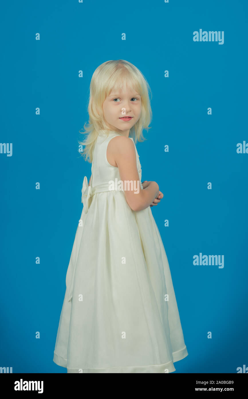 beauty and fashion. beauty of pretty small girl in dress Stock Photo ...