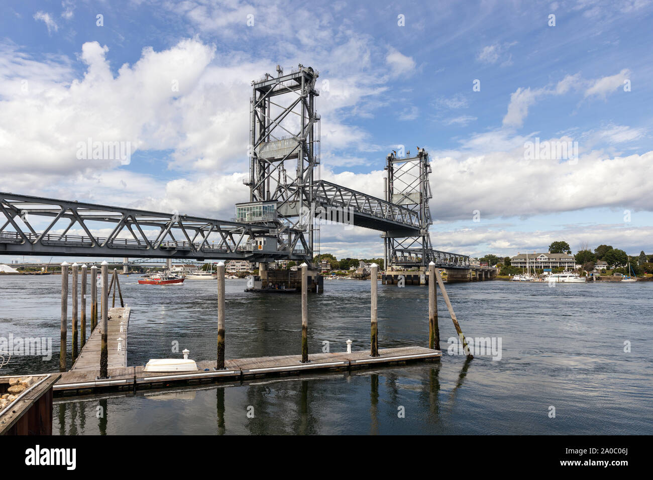 Vertical-lift bridge in raised position over fast flowing Piscataqua ...
