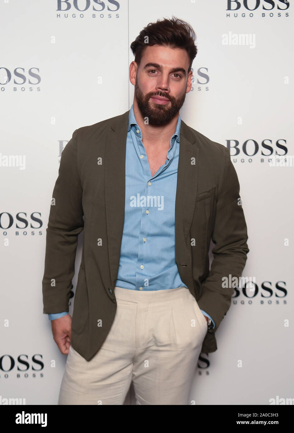 Timothy James attending the christening ceremony for the Hugo Boss ...