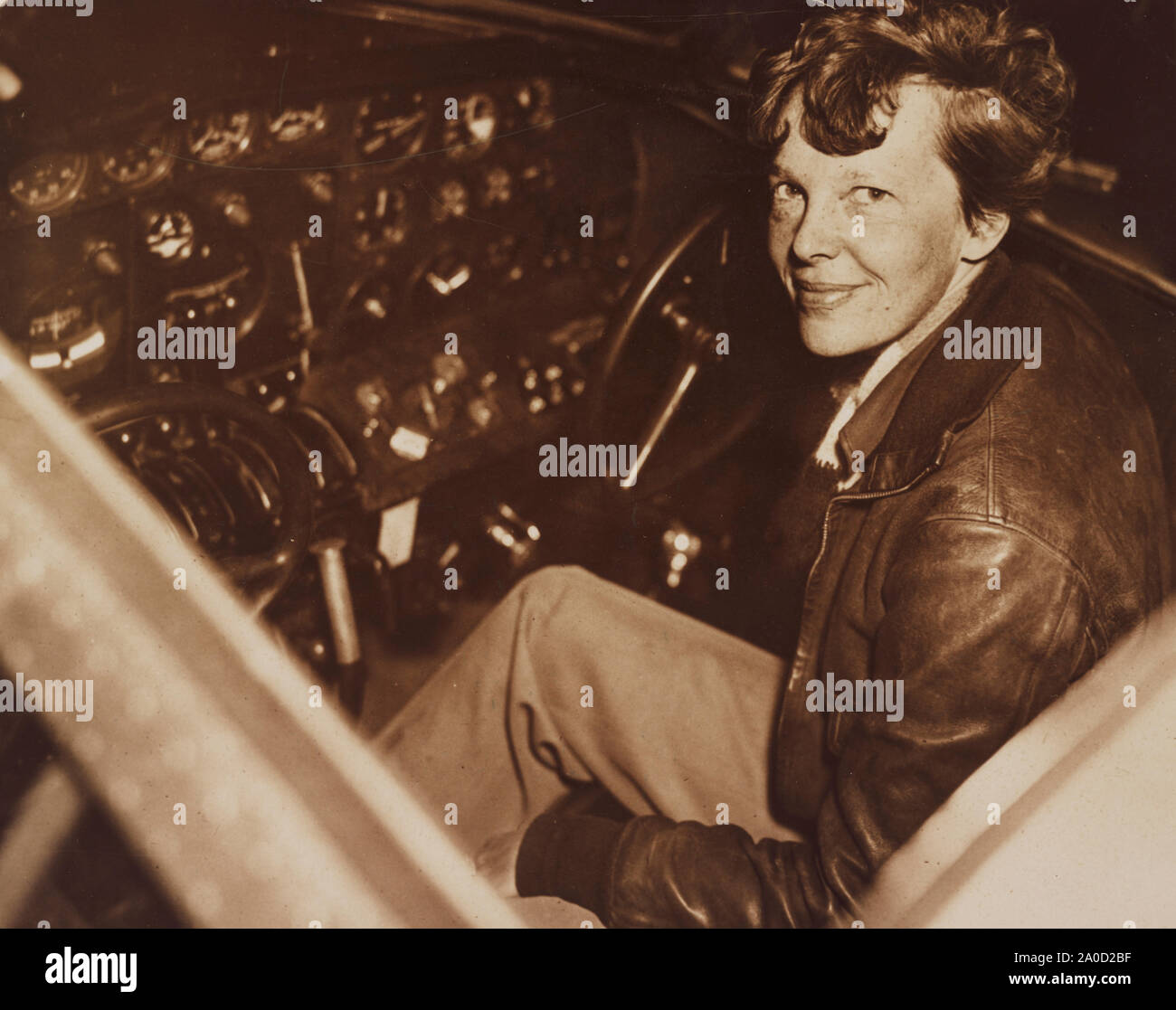 Amelia Earhart in the cockpit of her Lockheed Model 10-E Electra ...