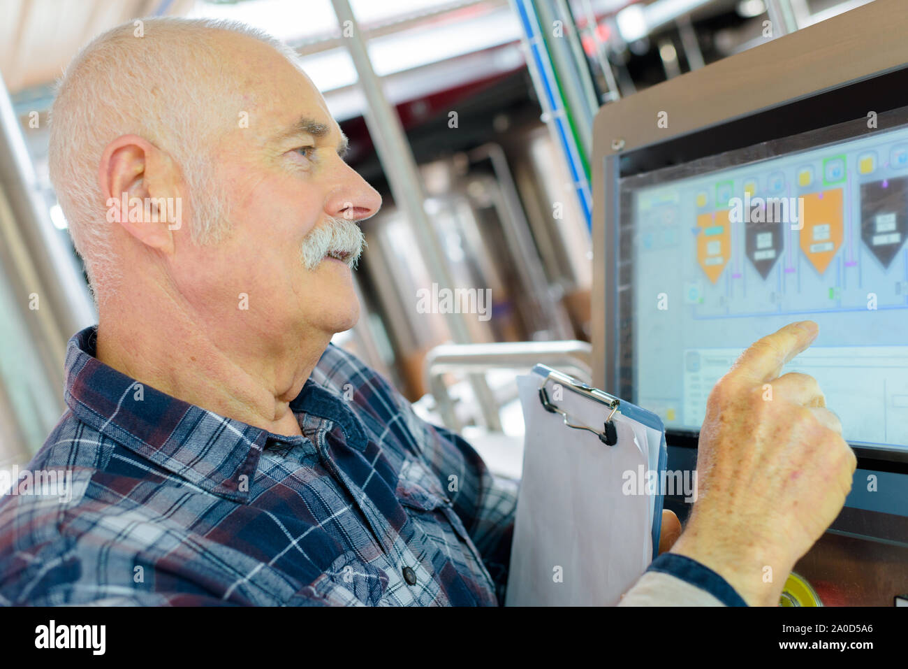 worker pressing a computer program interface Stock Photo - Alamy
