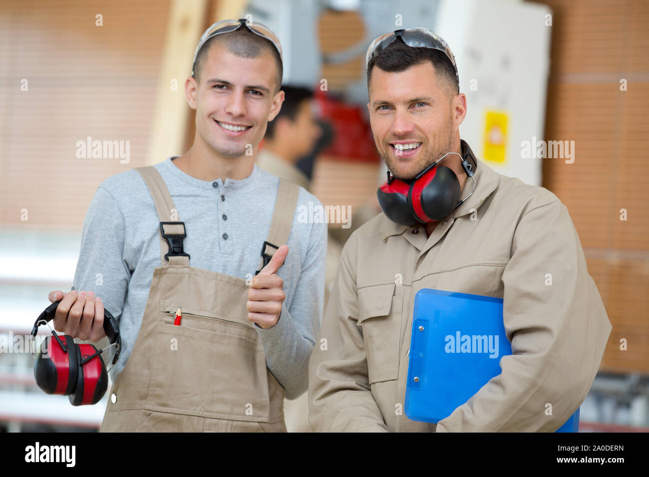 a portrait of two workers Stock Photo - Alamy