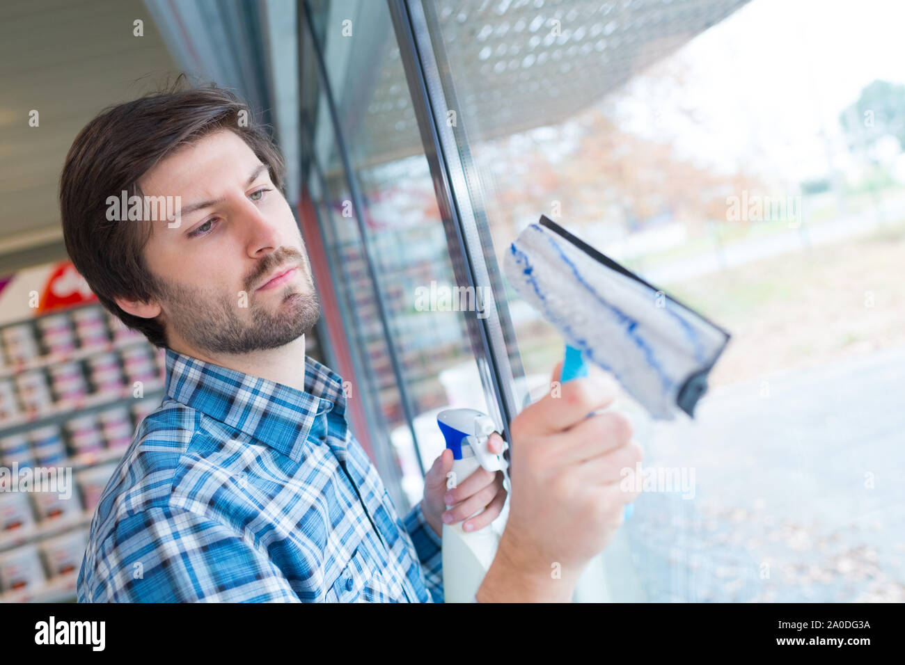 male workers cleaning window Stock Photo - Alamy