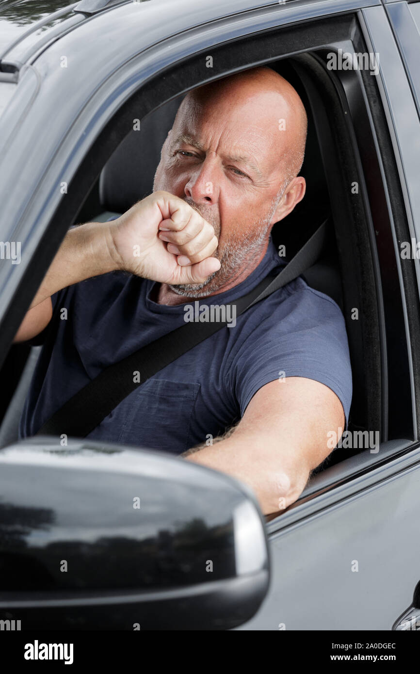 tired driver road trip summer time Stock Photo - Alamy