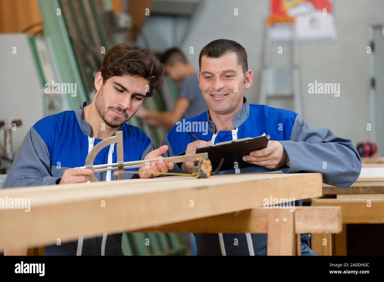 portrait of woodwork studio workers Stock Photo - Alamy