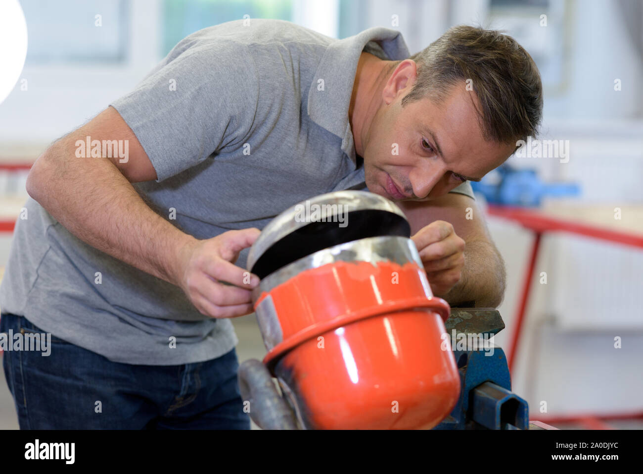 an engineer measuring metal object Stock Photo - Alamy