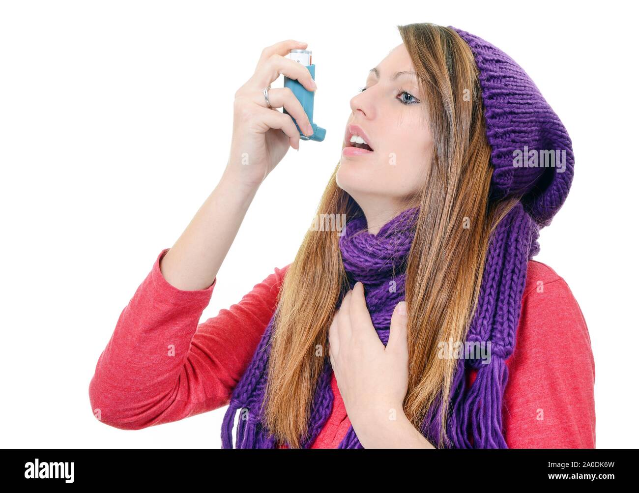 Woman with asthma using pump inhaler Stock Photo - Alamy