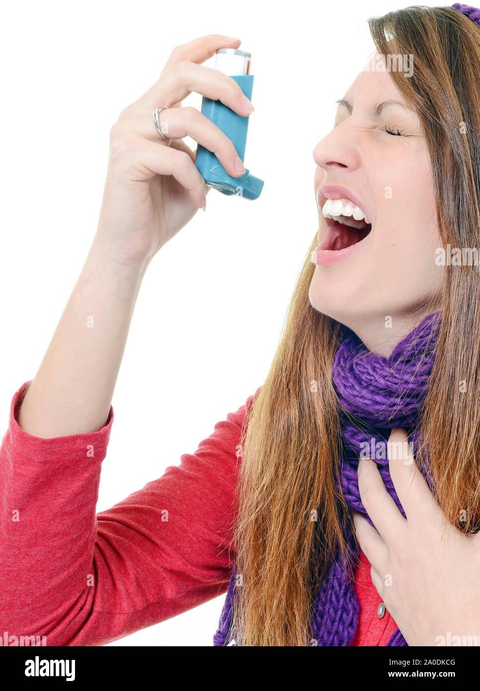 Woman with asthma using pump inhaler Stock Photo - Alamy