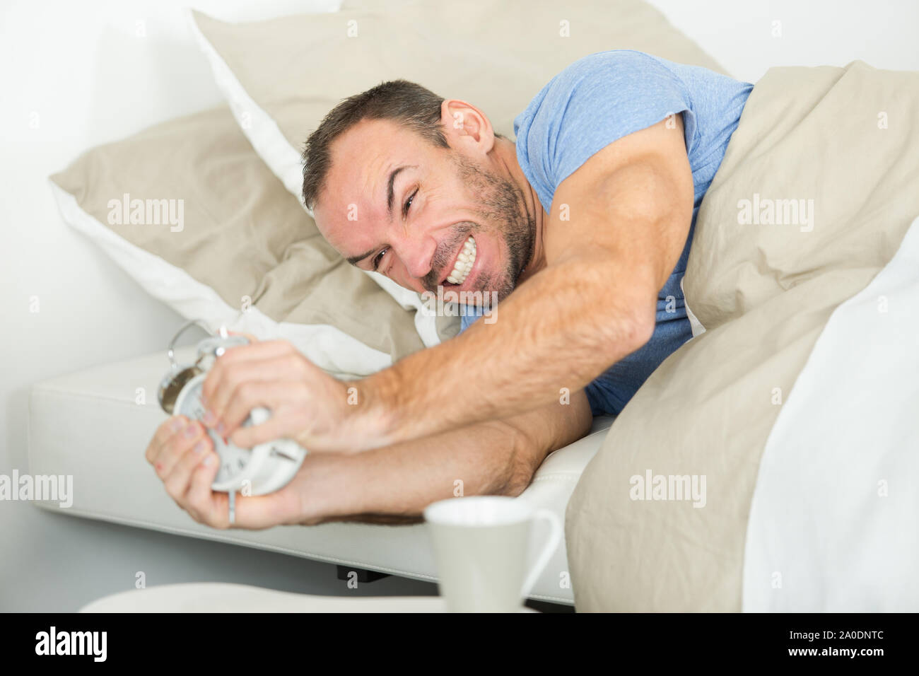 angry man running out of time in the morning Stock Photo - Alamy