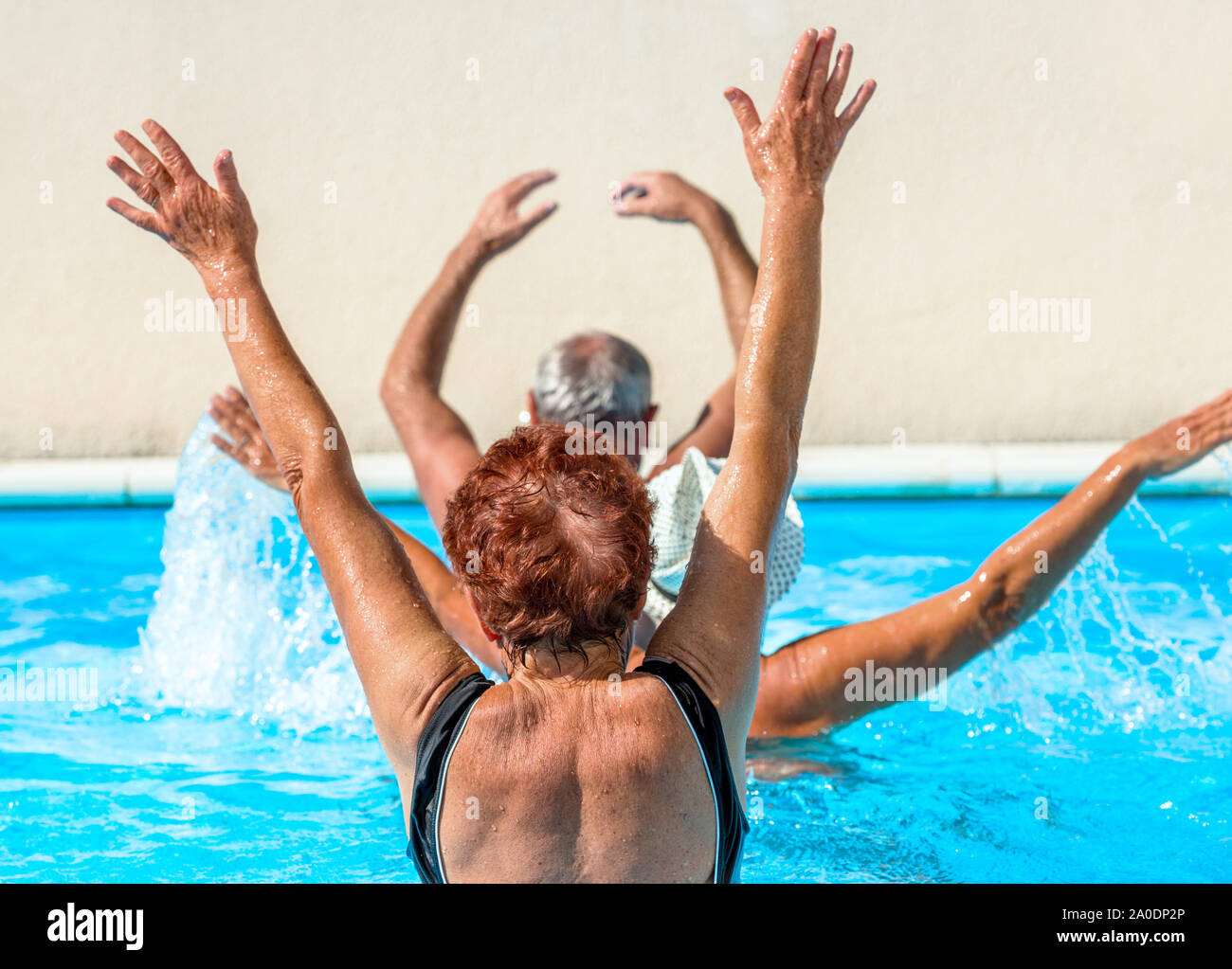 Active seniors getting a workout at the swimming pool Stock Photo - Alamy