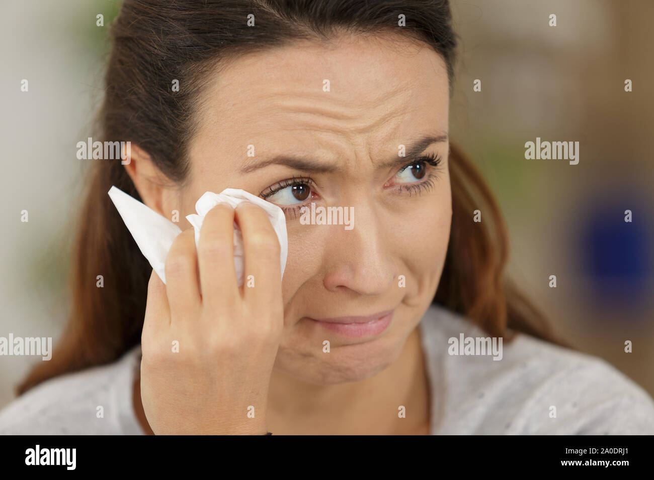 sad woman drying the tears Stock Photo - Alamy