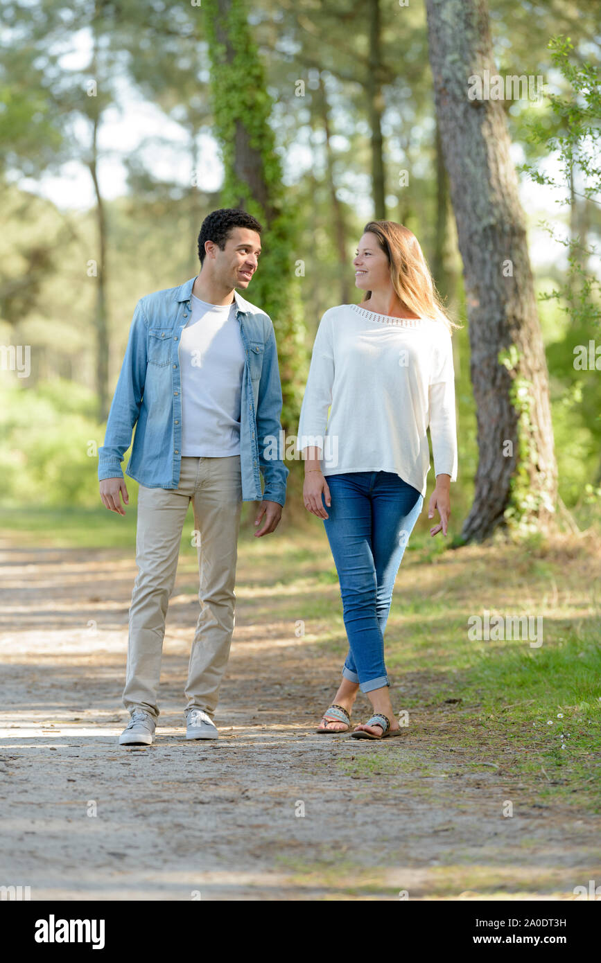 Attractive couple walking woods hi-res stock photography and images - Alamy
