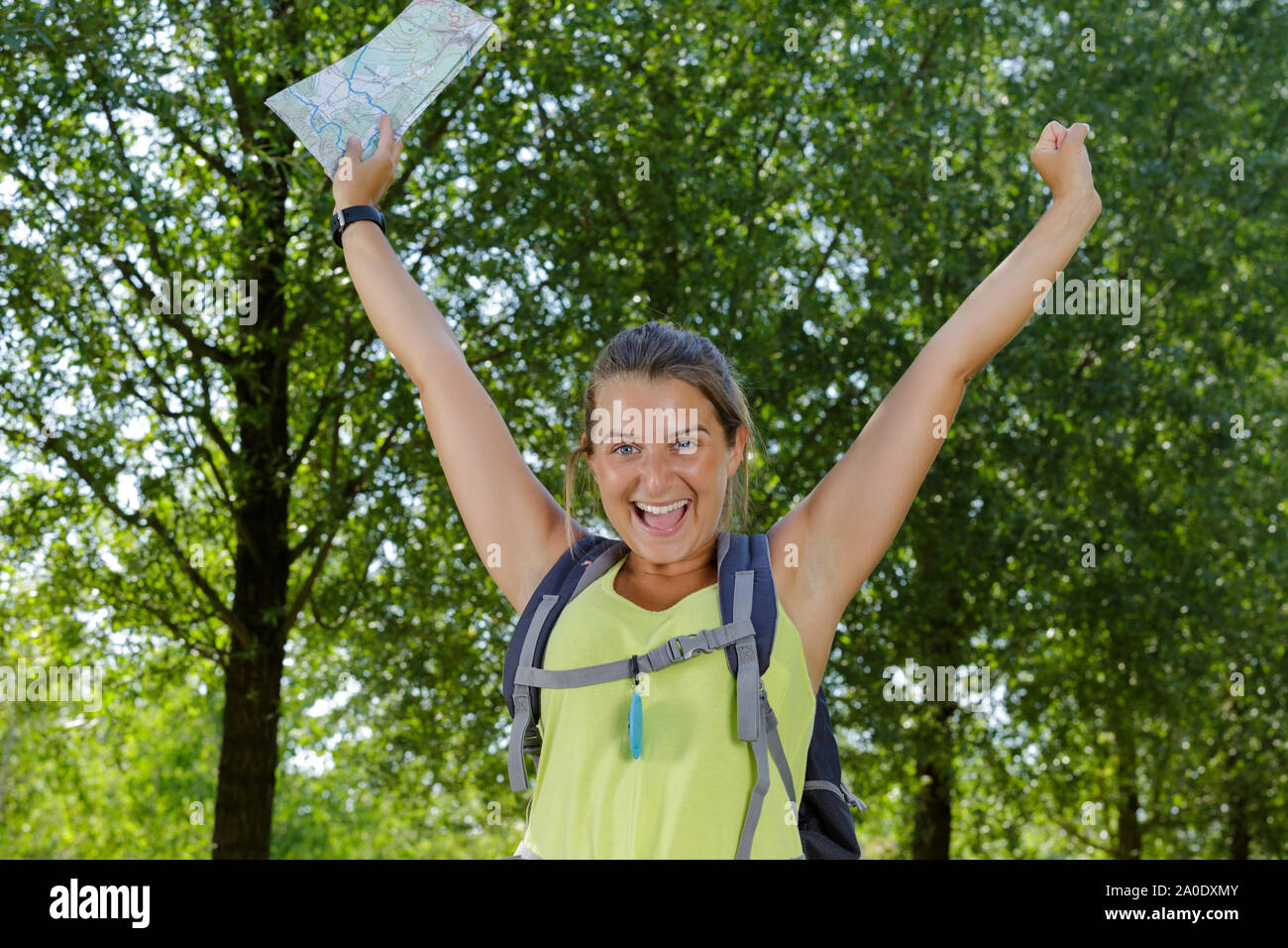 female hiker happy to arrive at her destination Stock Photo - Alamy