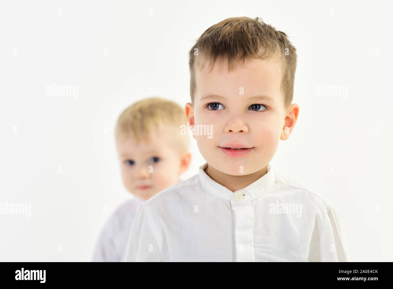 Happy family, values, brothers. Little boys in white shirt, business ...