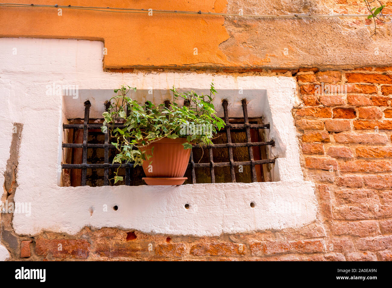 wrought iron window of a typical Venetian house, Italy Stock Photo - Alamy
