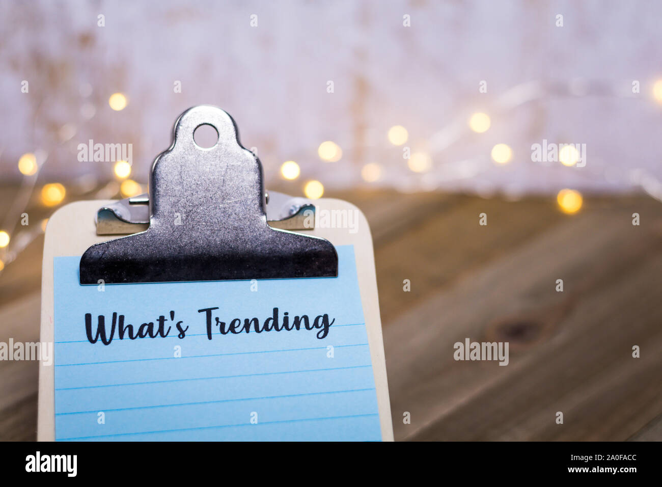 What's Trending concept with words on handheld paper Stock Photo - Alamy