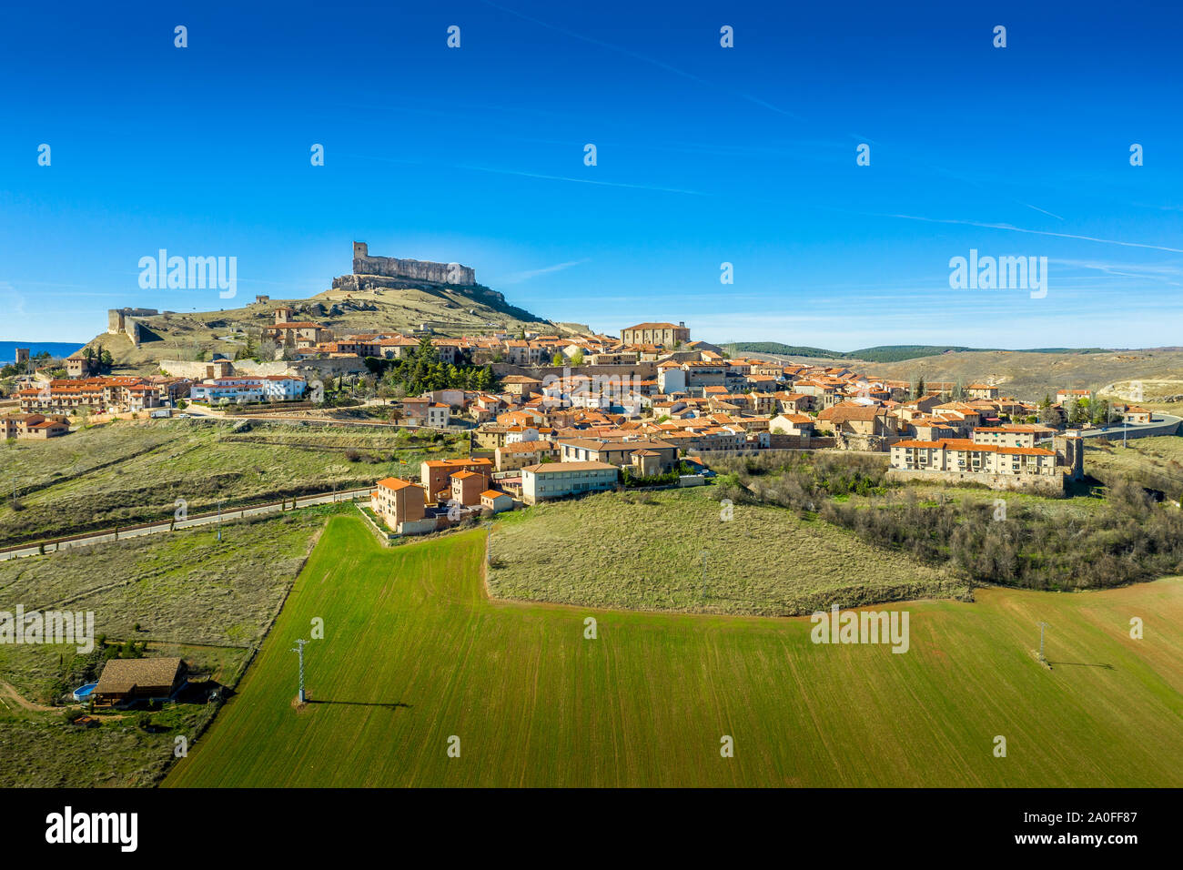 Atienza aerial panorama with blue sky of medieval ruined castle and ...