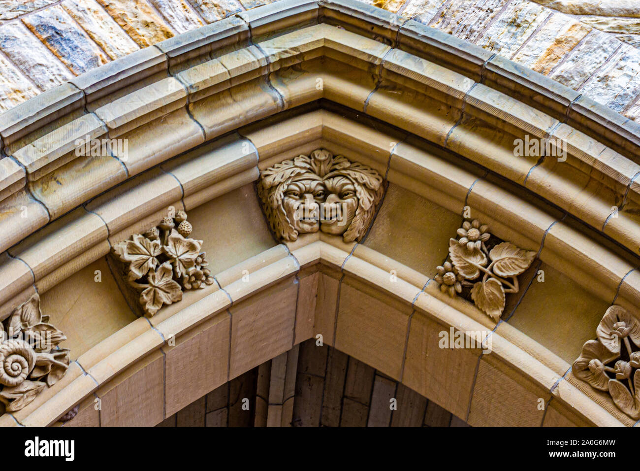 Sandstone artwork in an archway near the entrance to the Centre Block ...