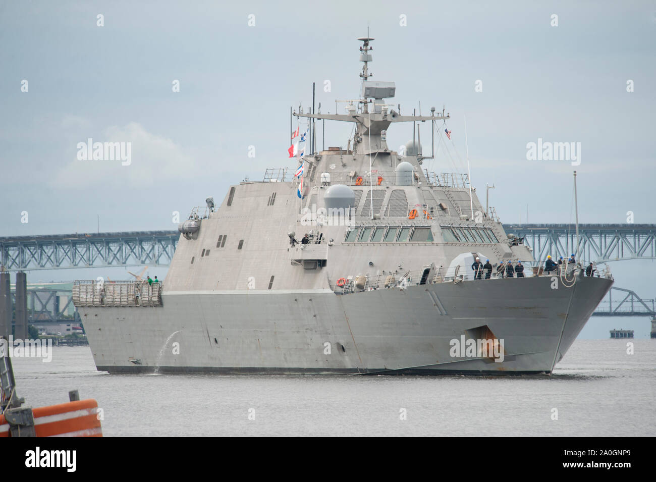 The Littoral Combat Ship USS Sioux City (LCS 11) makes her way up the ...