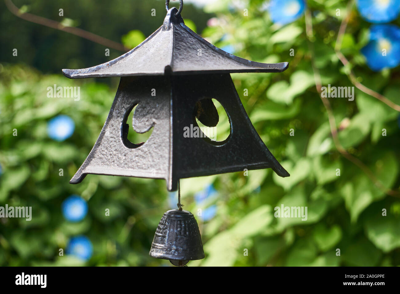 Dark gray metal bell in the shape of a traditional lantern with moon ...