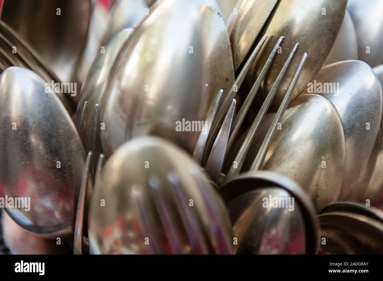 A group of old spoons and forks in close-up view Stock Photo - Alamy