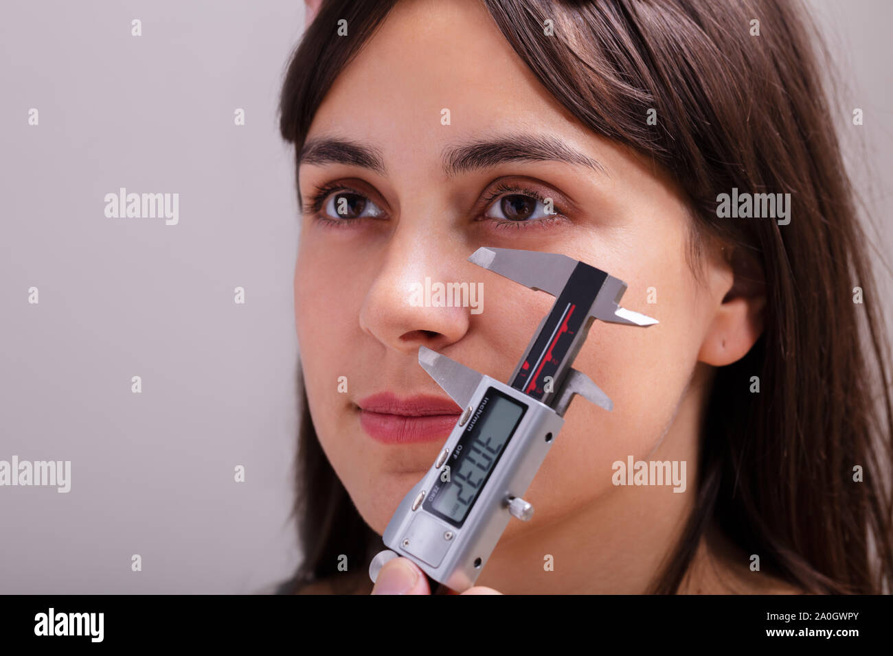 Face and (caliper or calipers) hi-res stock photography and images - Alamy