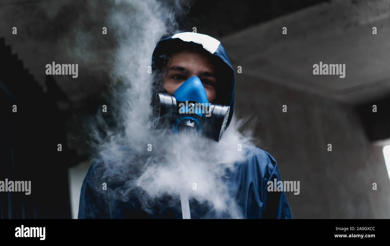 Protection respirator half mask for toxic gas.The man prepare to wear ...