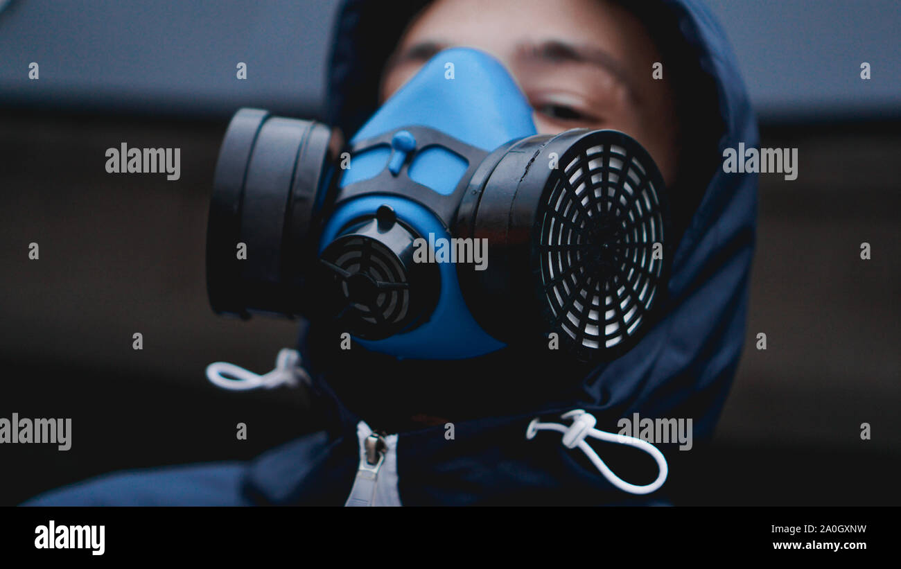 Protection respirator half mask for toxic gas.The man prepare to wear ...