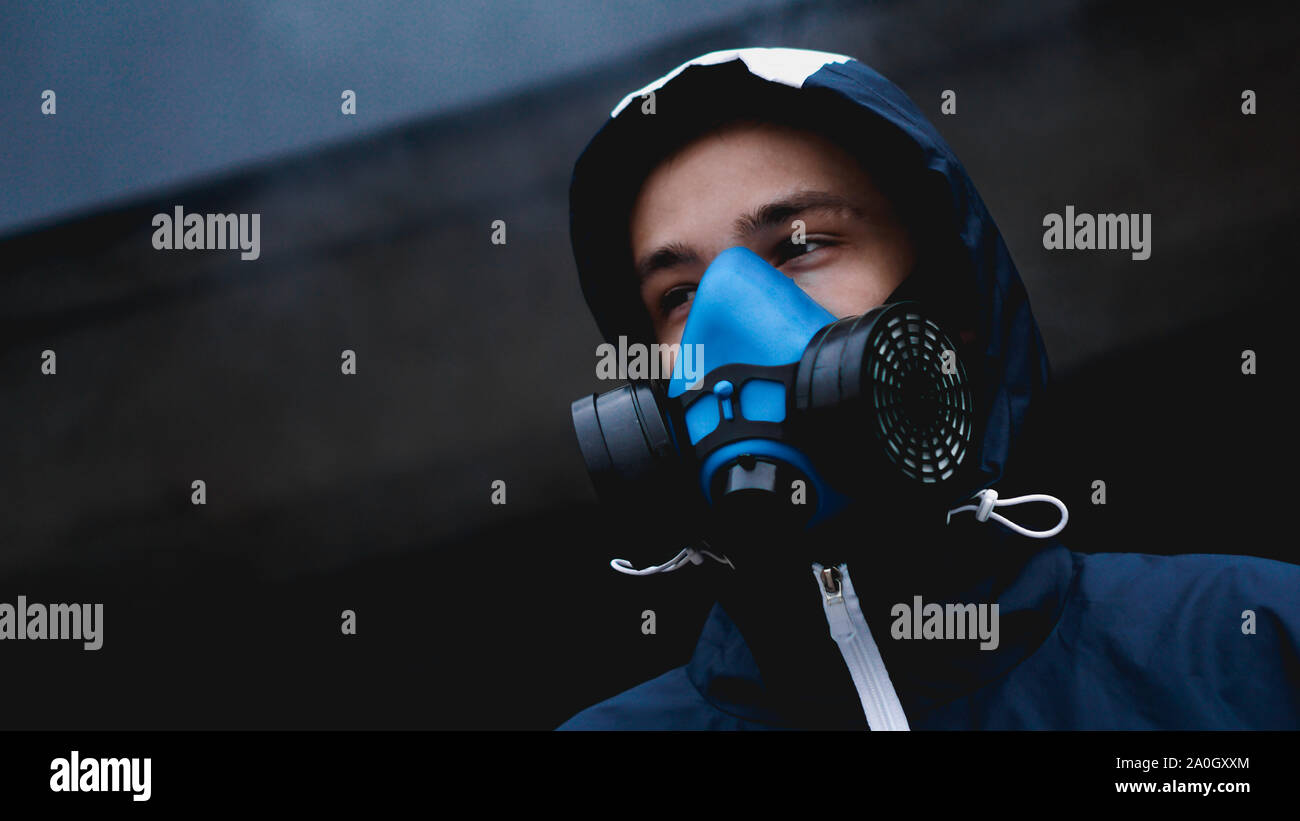 Protection respirator half mask for toxic gas.The man prepare to wear ...