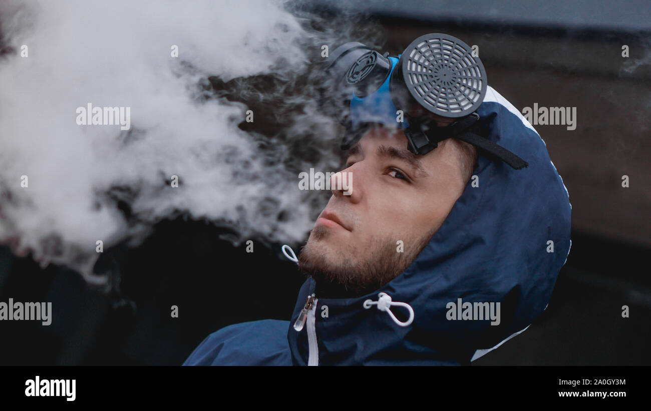 Protection respirator half mask for toxic gas.The man prepare to wear ...